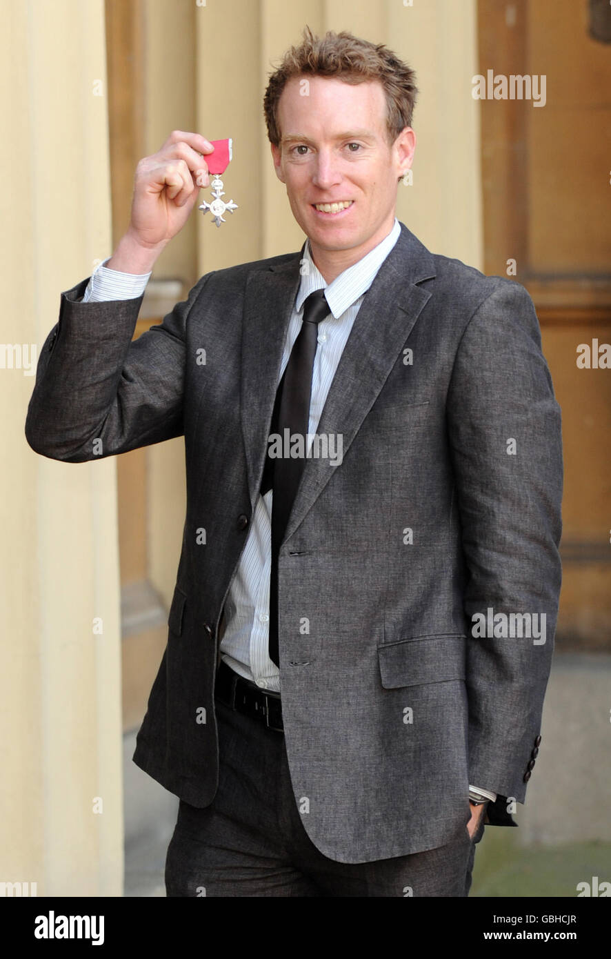 Investiture at Buckingham Palace. Sailor Paul Goodison poses with his ...