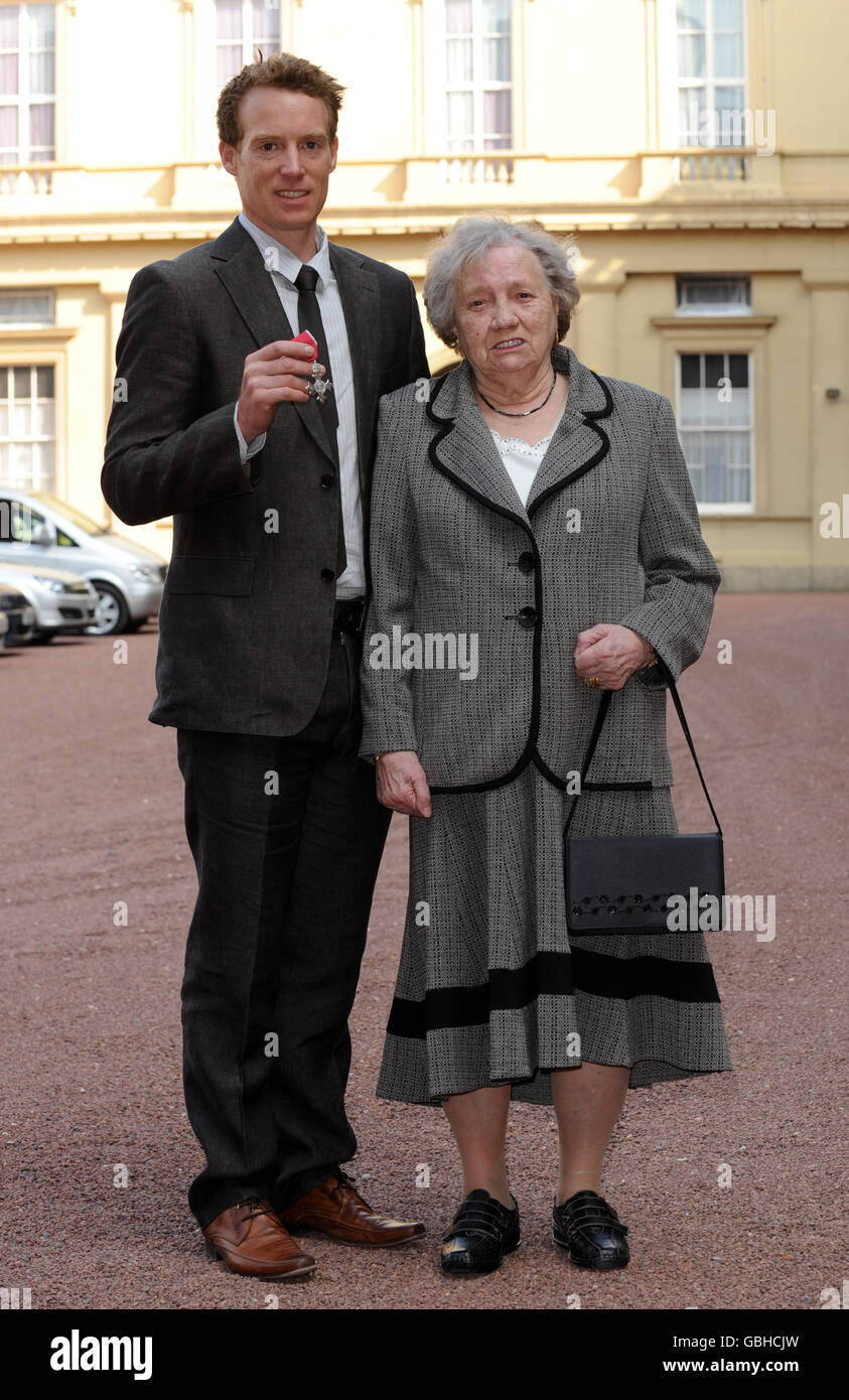Sailor Paul Goodison poses with his grandmother after receiving an OBE ...