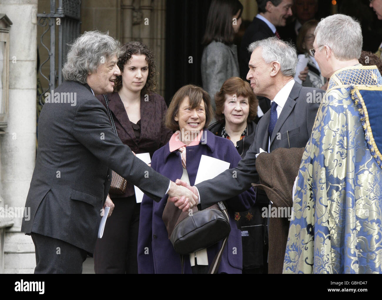 Widow of actor Paul Scofield, Joy Parker (center) and their son Martin ...