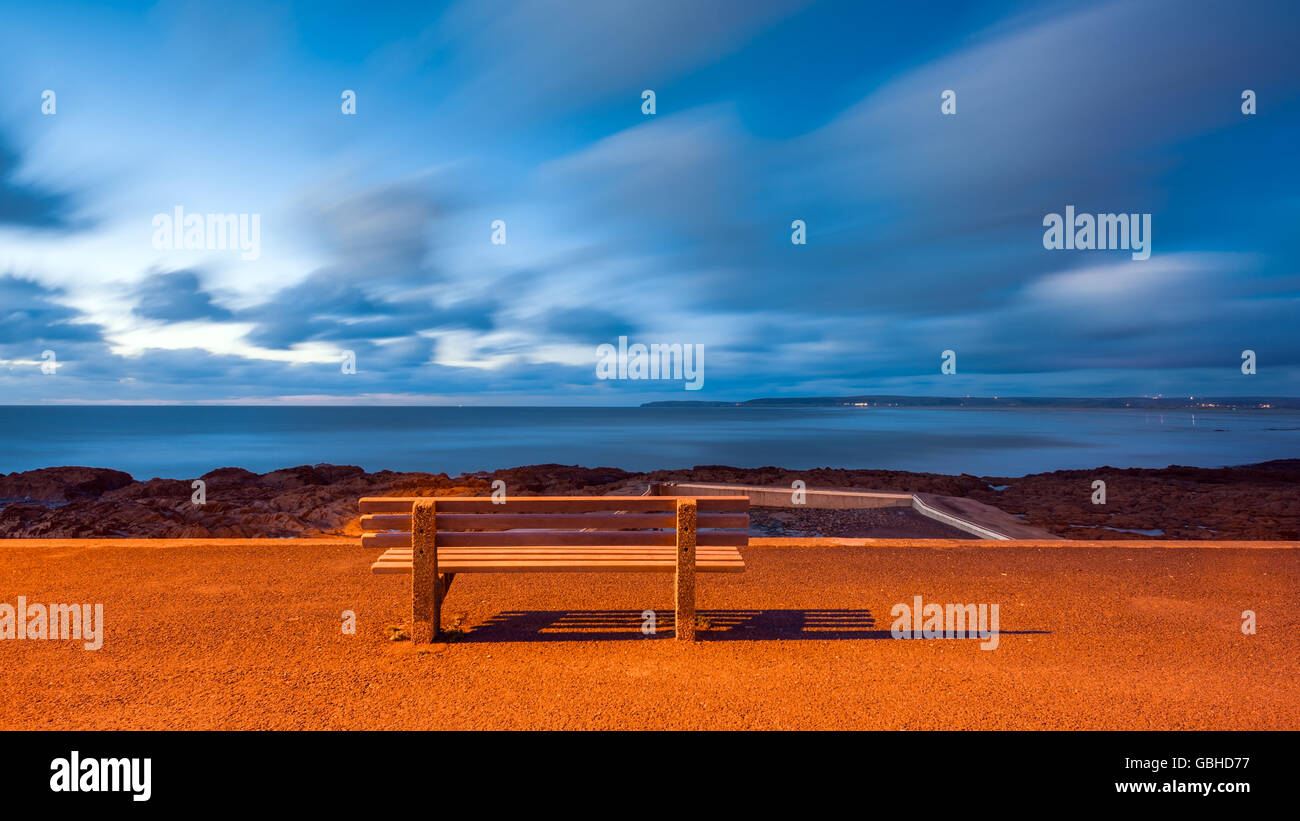 Wooden bench seat at seafront Stock Photo - Alamy