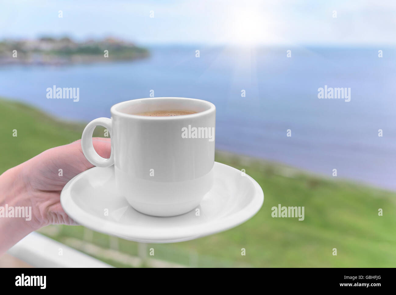 Hand on a cup hi-res stock photography and images - Alamy