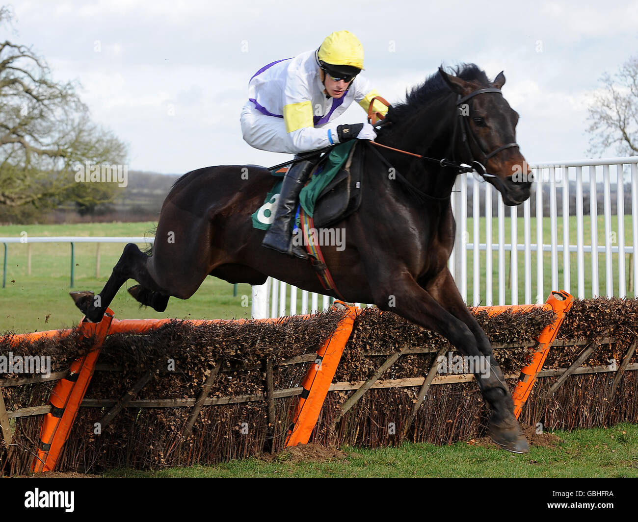 Horse racing races full length jumps jockey hi-res stock photography ...