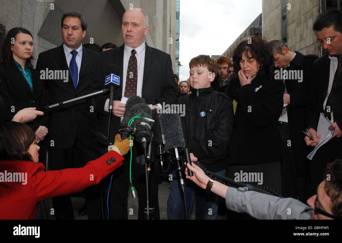Barry and Margaret Mizen, with their nine year old son George, outside ...