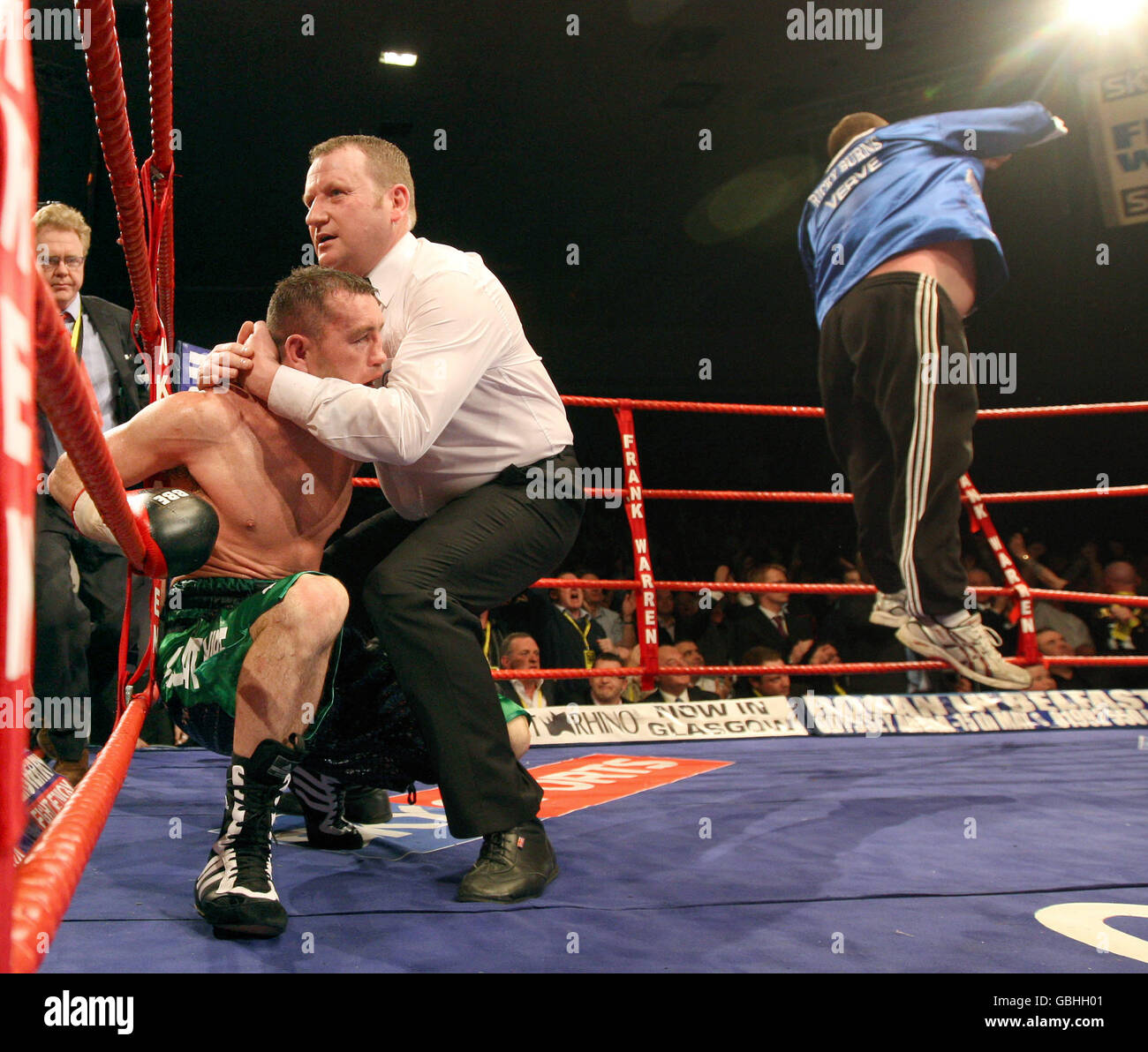 Ricky Burns trainer Billy Nelson (right) celebrates after the referee ...