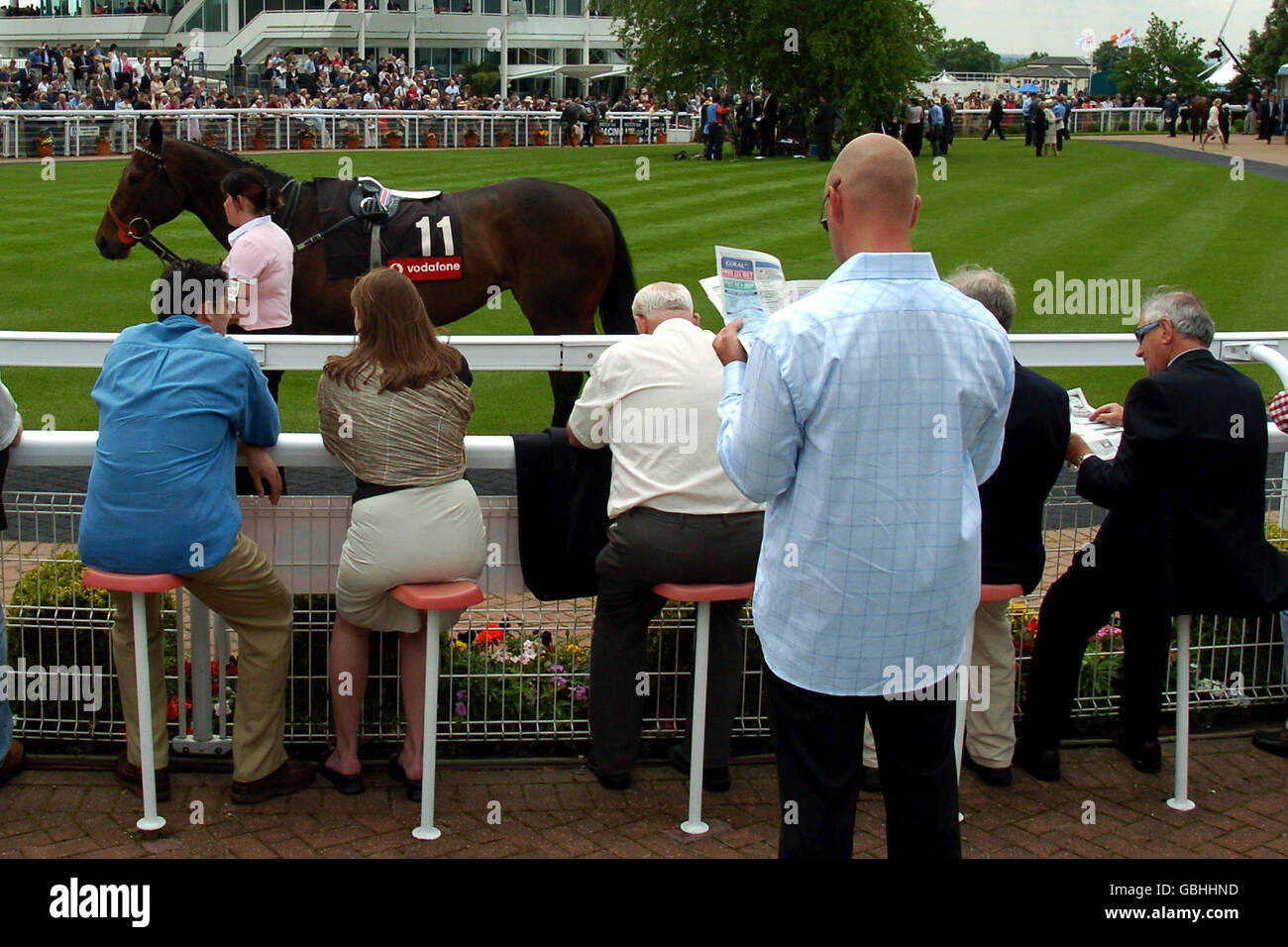 Horse Racing - Epsom Races - Vodafone Oaks Day. Racegoers see the ...