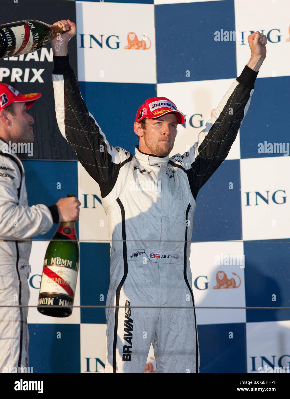 Brawn GP's Jenson Button celebrates winning the Australian Grand Prix ...