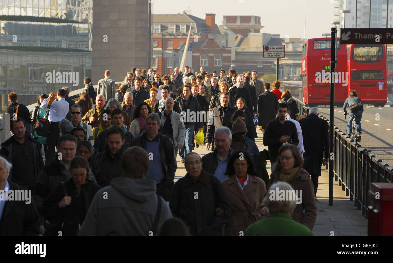 Workers cross London Bridge into the City of London where a G20 protest ...