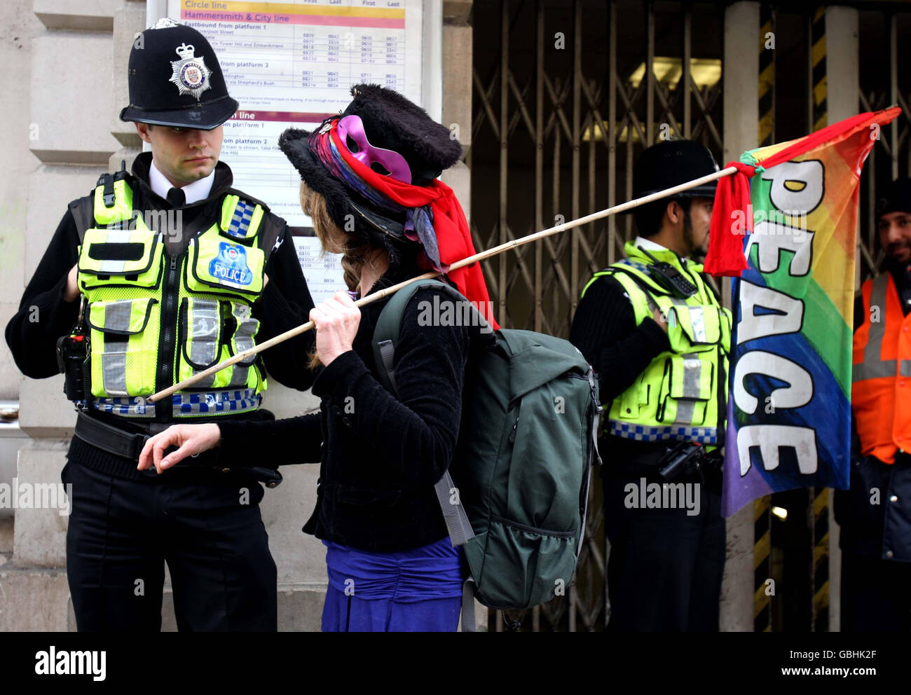 A protester speaks to a policeman outside Moorgate Tube station during ...