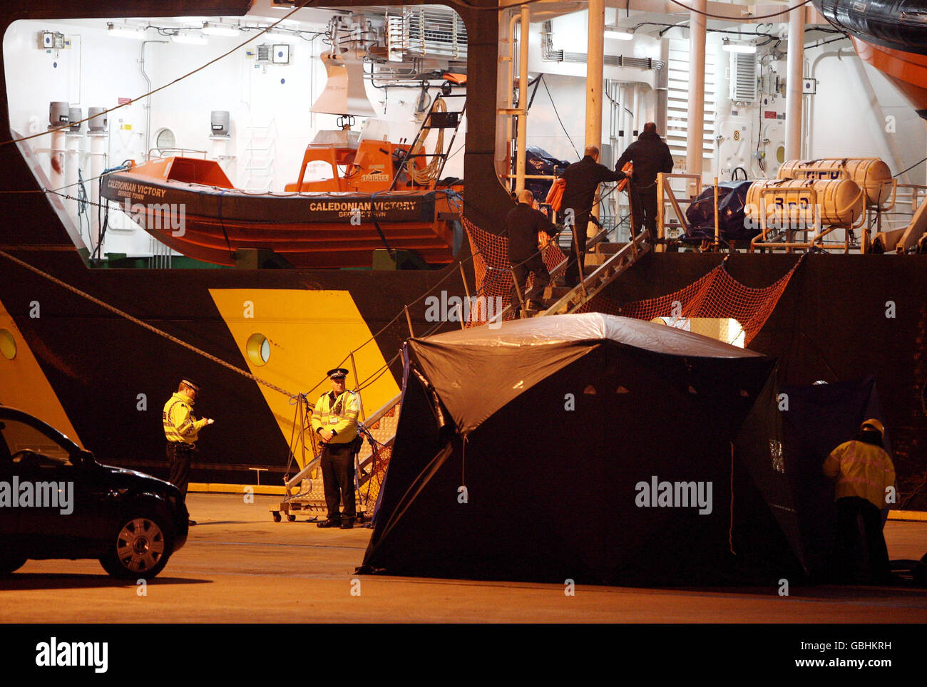Forensic tents are put up around the Caledonian Victory vessel which ...