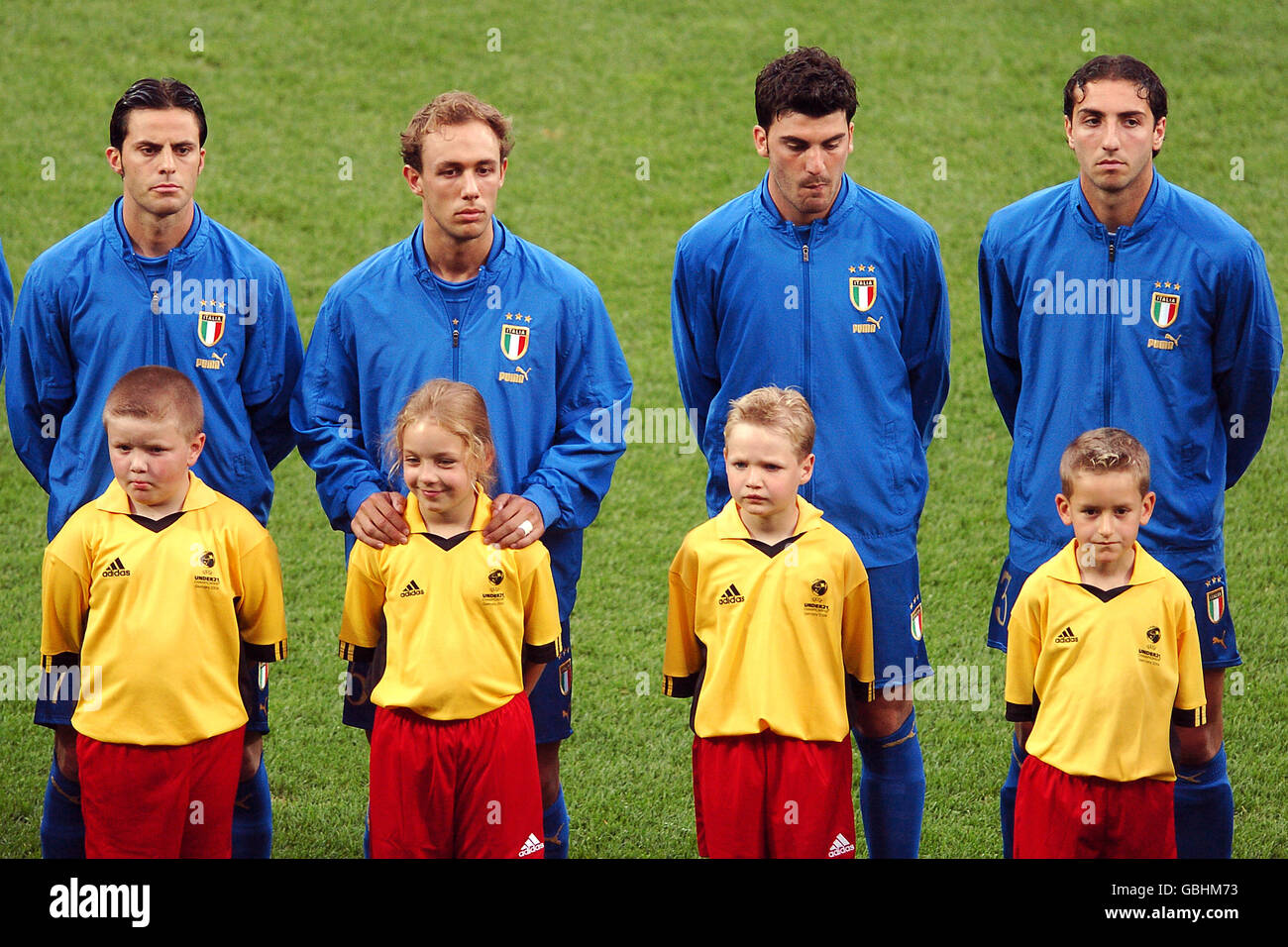 Italy players line up with mascots hi-res stock photography and images ...