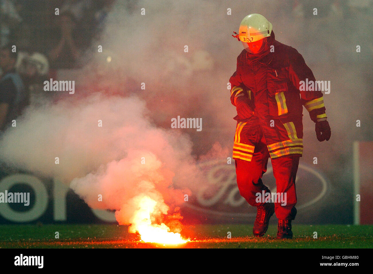 Football full length fire flare firework fireman hi-res stock ...