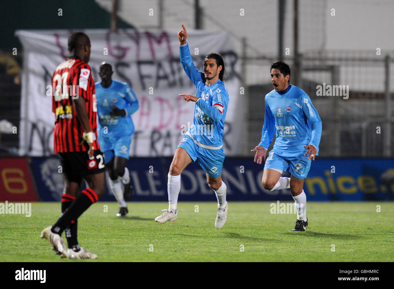 Caen's Nicolas Seube (centre) celebrates after scoring the third goal ...