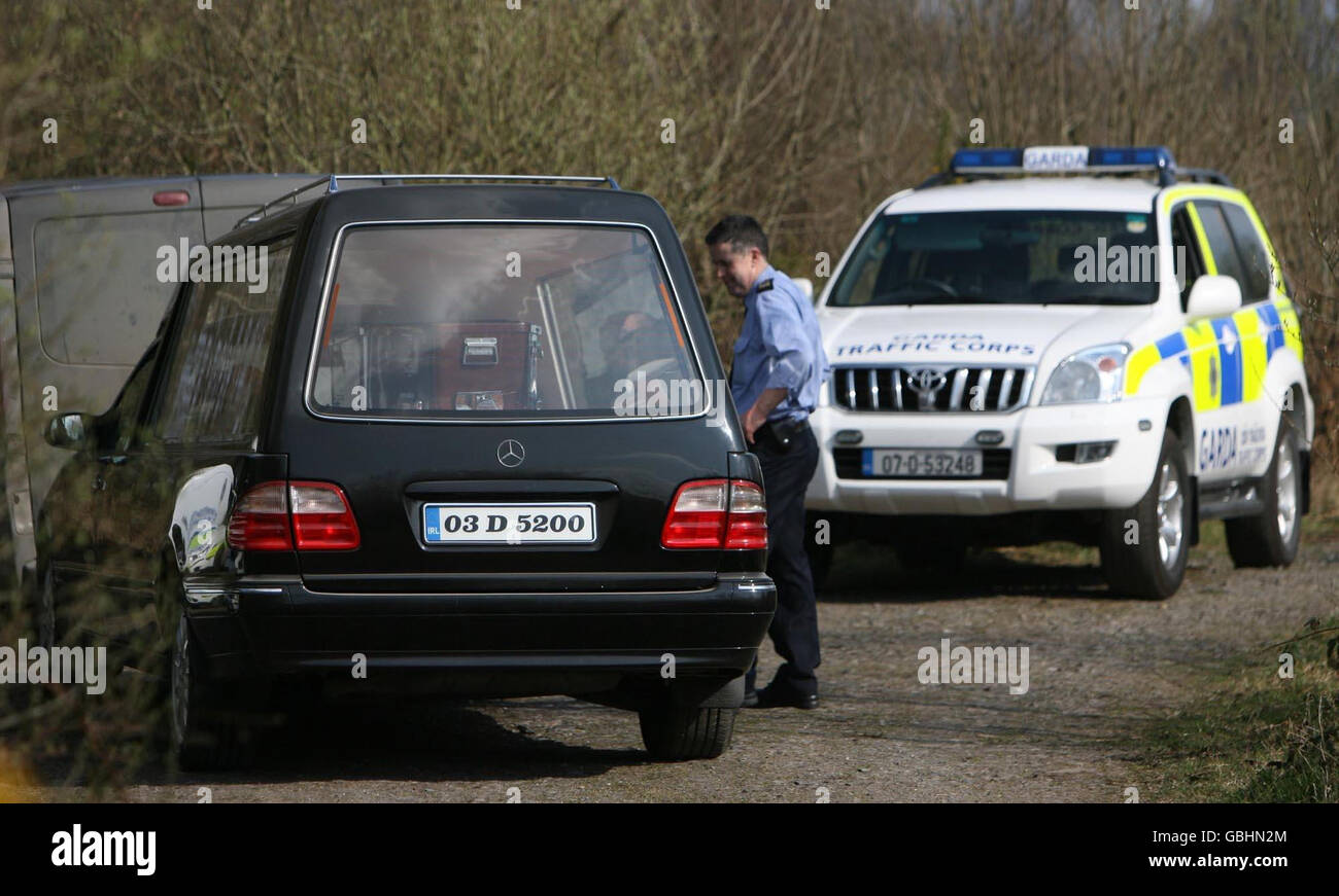 Helicopter crash in Ireland. A hearse at the scene where two men were ...