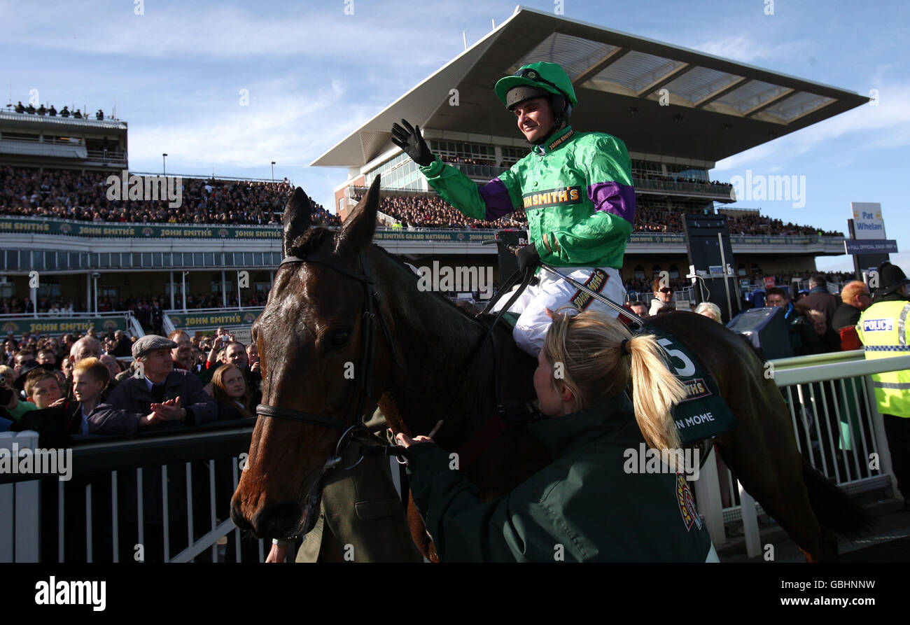 Mon Mome and jockey Liam Treadwell celebrate winning the John Smith's ...