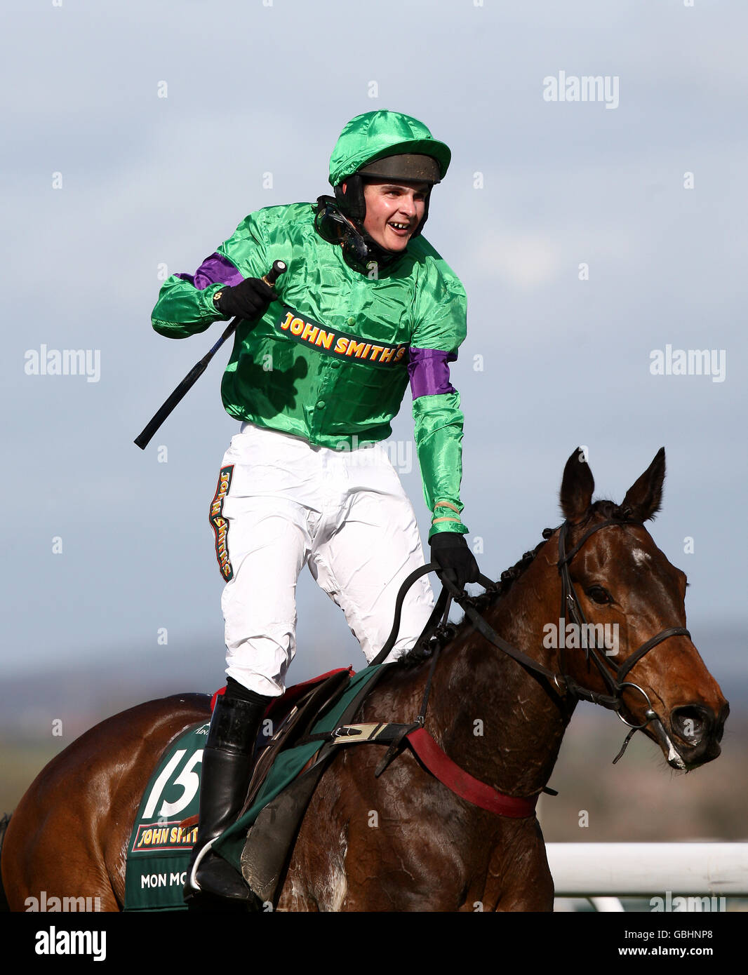 Mon Mome and jockey Liam Treadwell celebrate winning the John Smith's ...