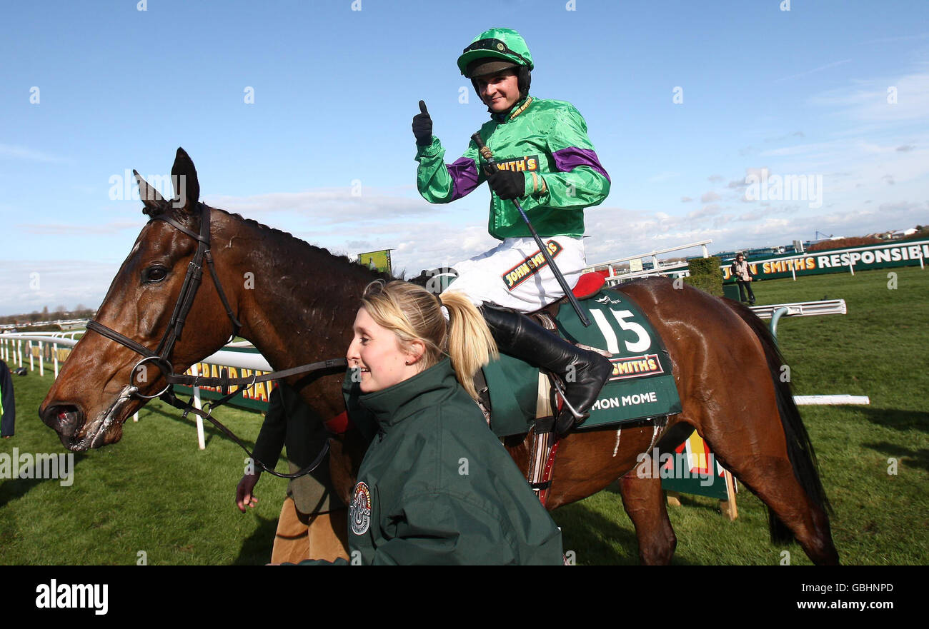 Mon Mome and jockey Liam Treadwell celebrate winning the John Smith's ...