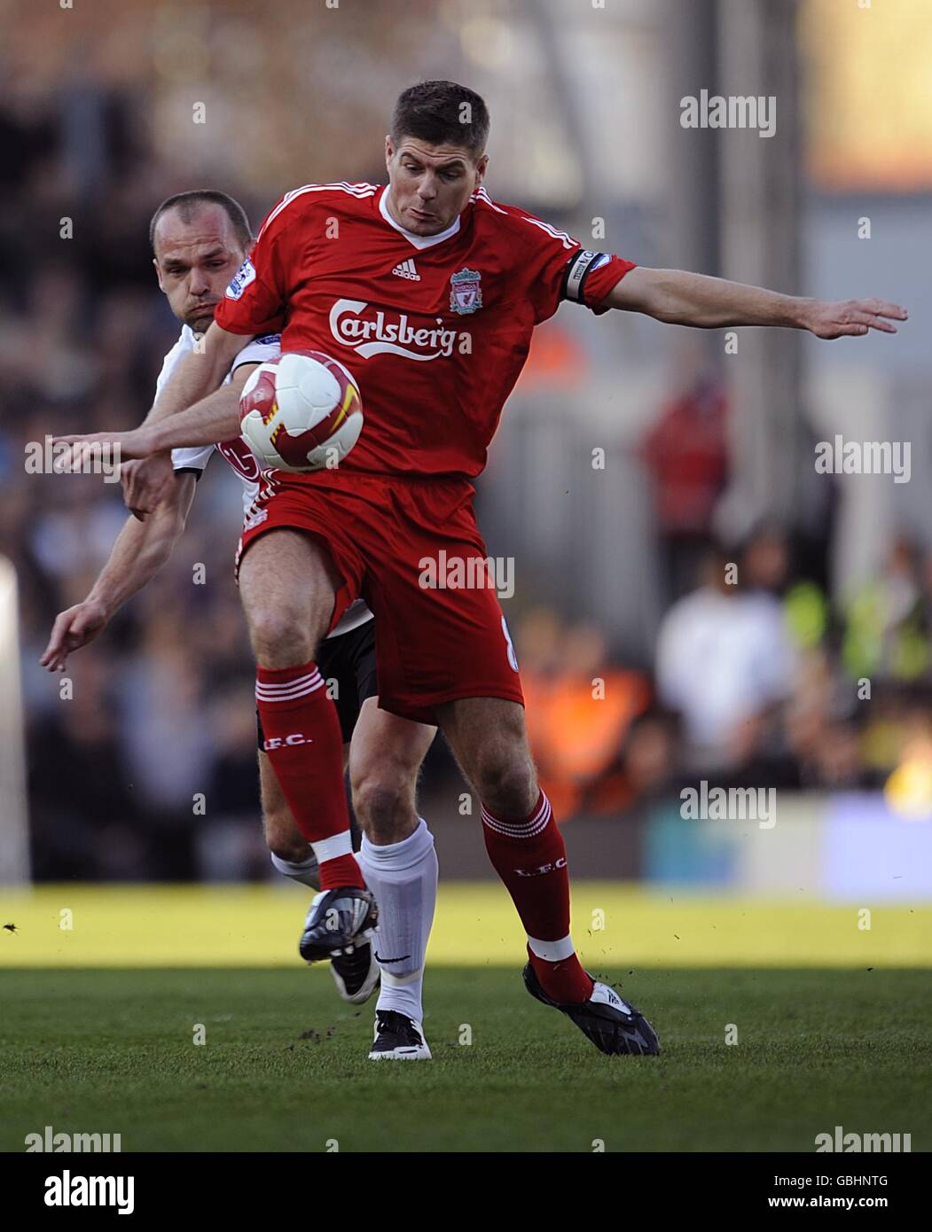 Liverpool's Steven Gerrard (right) and Fulham's Danny Murphy (left ...