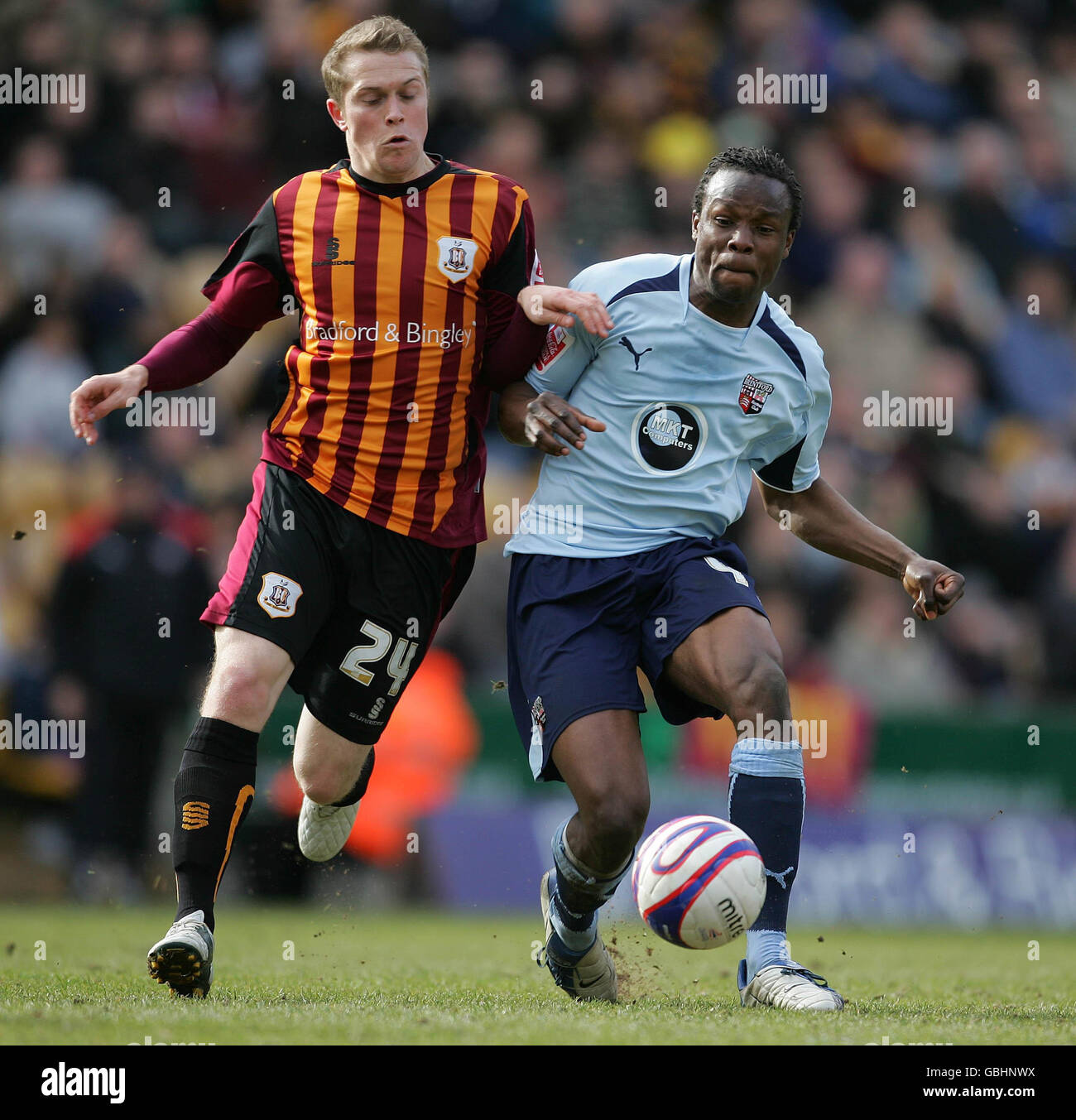 Bradford City's Nicky Law and Brentford's Marcus Bean in action during ...
