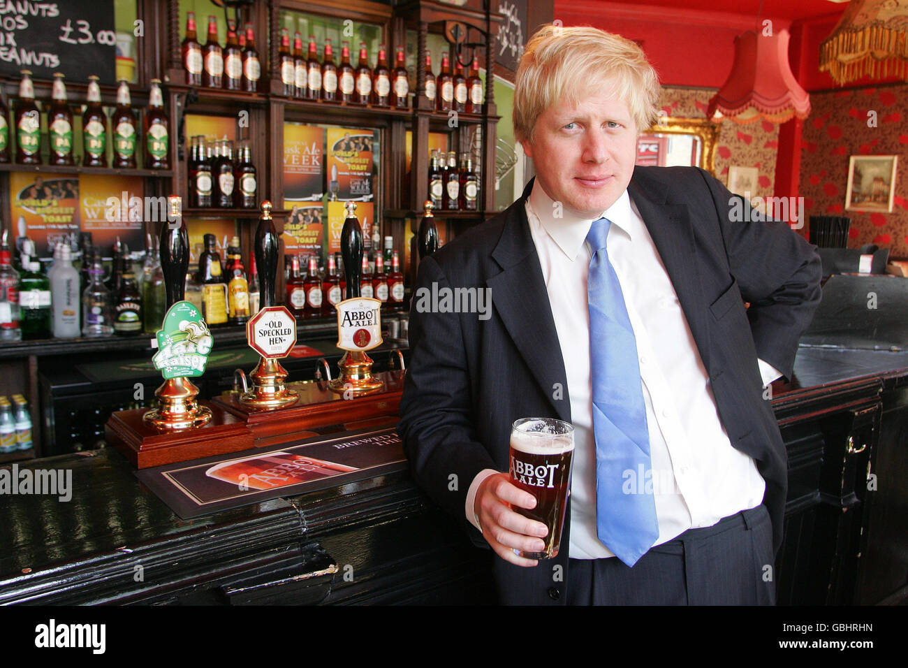 London Mayor Boris Johnson enjoys a pint of Greene King's Abbot Ale at ...