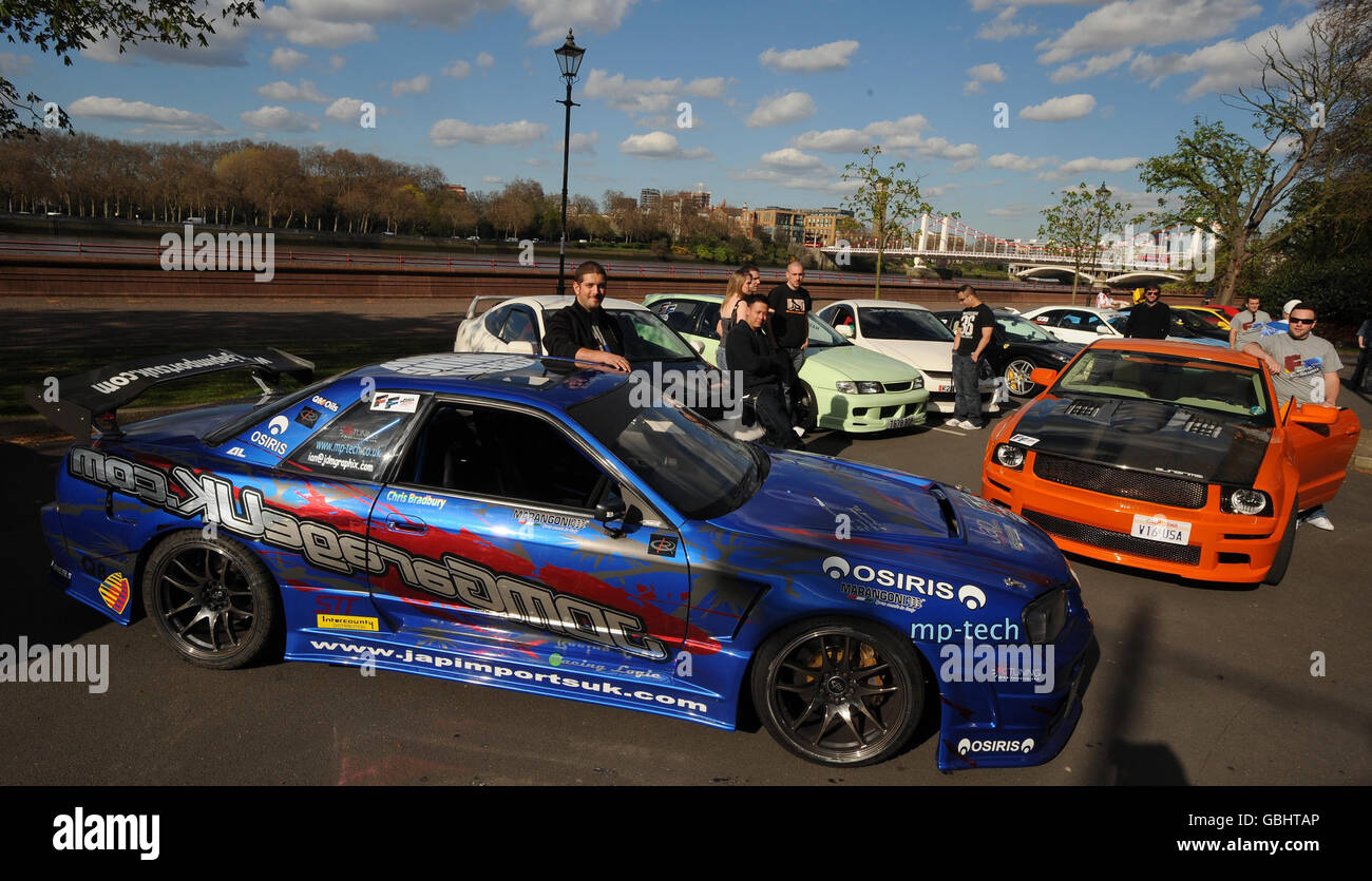 A convoy of twenty of the top UK muscle cars drive through London's ...