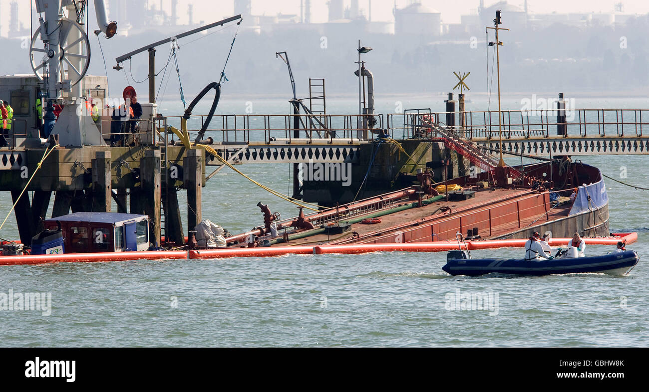The MV Humber Star, containing a load of sludge, sits semi submerged ...