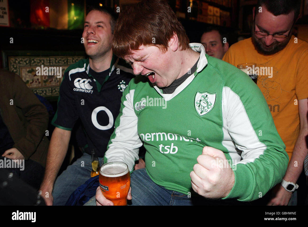 Irish Rugby fan Colm O'Dea in McDaids Pub, Dublin shows his joy as he ...