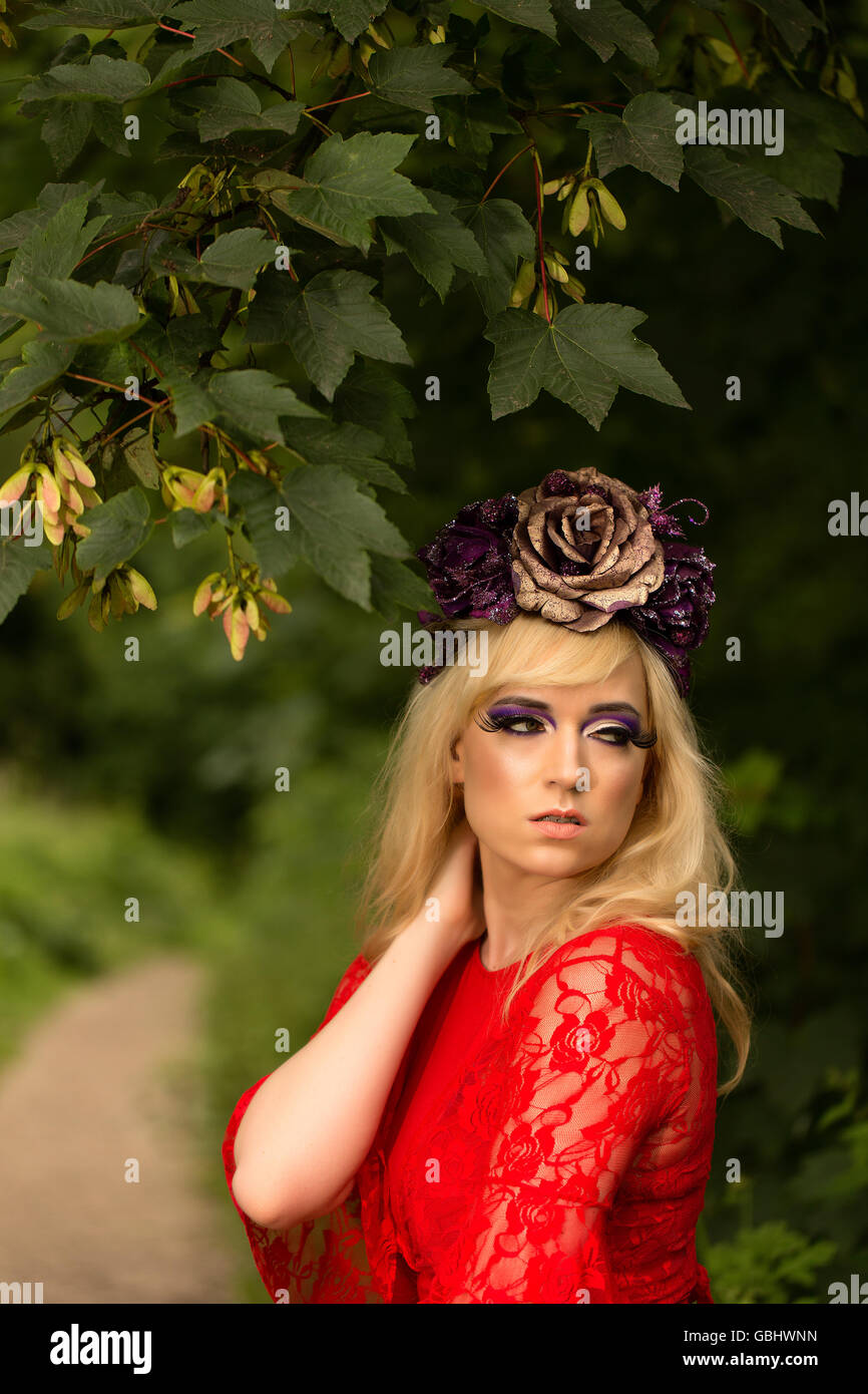 Blonde romantic pre-raphaelite fairy elf model, barefoot with gold ...