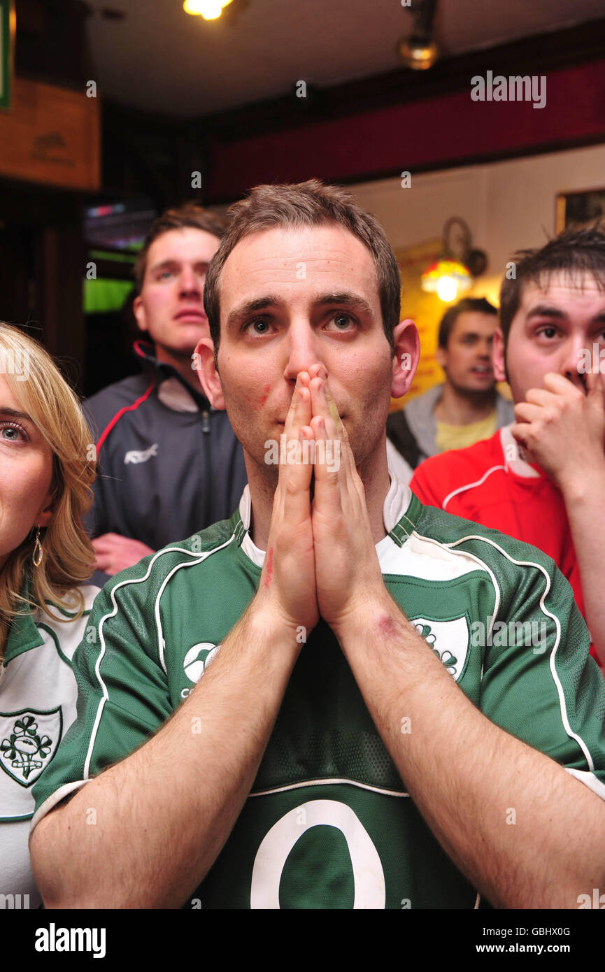 An Ireland rugby fan is tense as he watches his team against Wales in ...