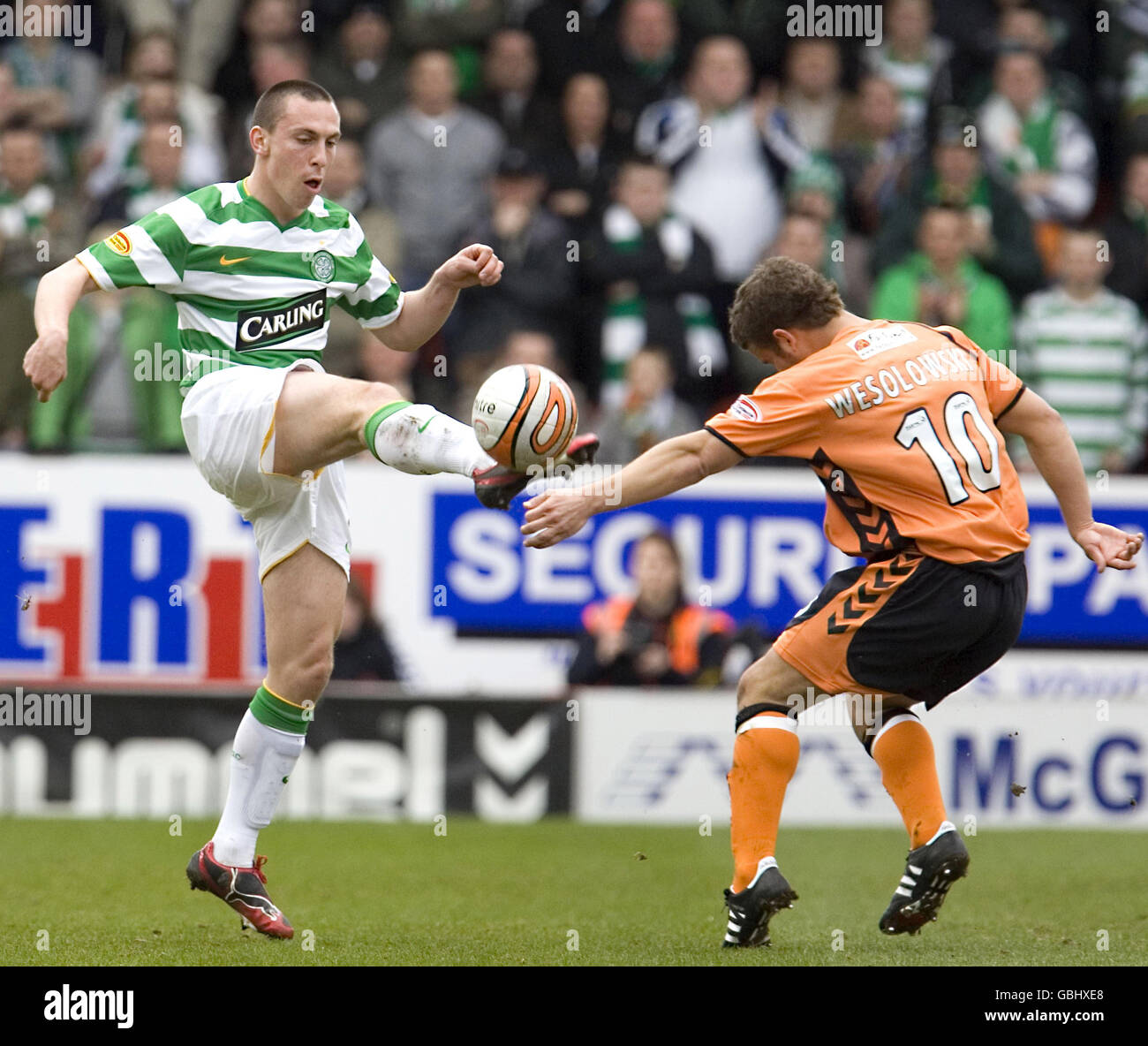 Soccer celtic full length kicking mangdm hi-res stock photography and ...