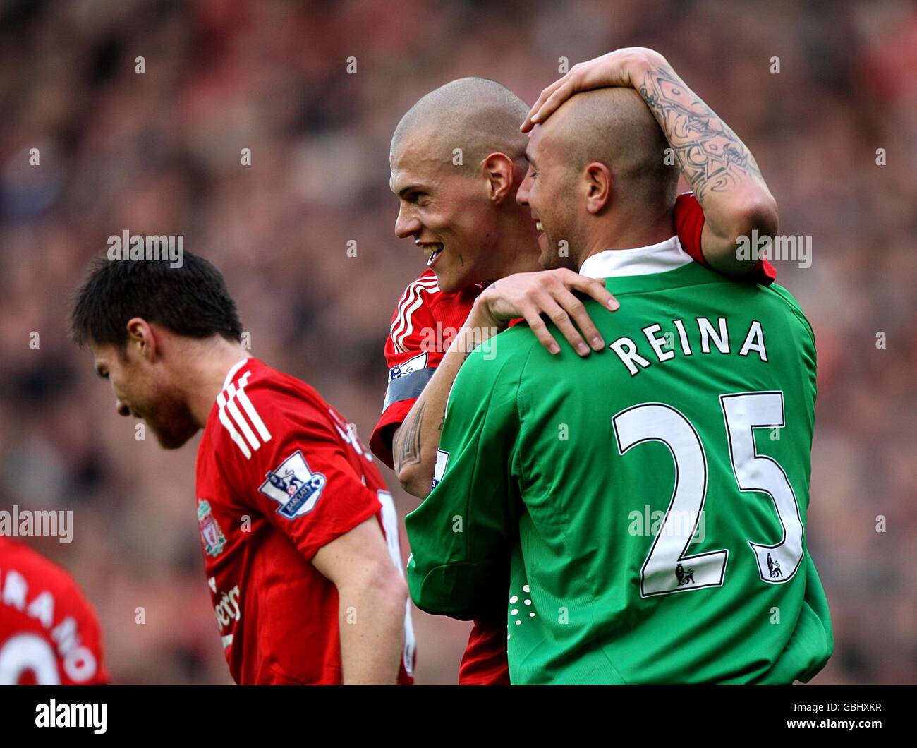 Liverpool's Goalkeeper Jose Reina is congratulated after setting up a ...