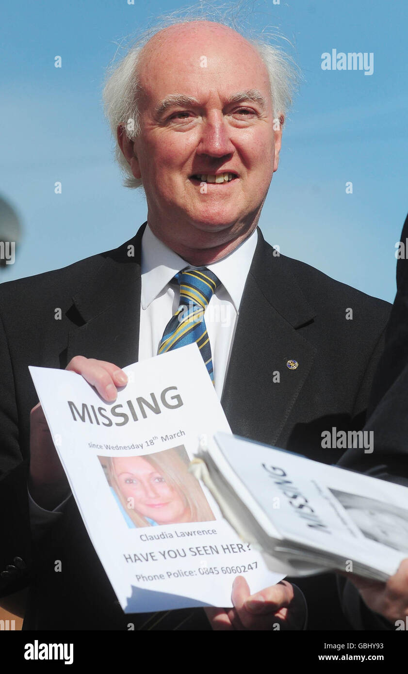 Peter Lawrence, father of missing Claudia Lawrence, holds a poster of ...