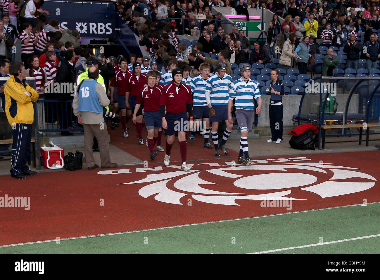 Edinburgh Academicals' and George Watson's College players walk onto ...