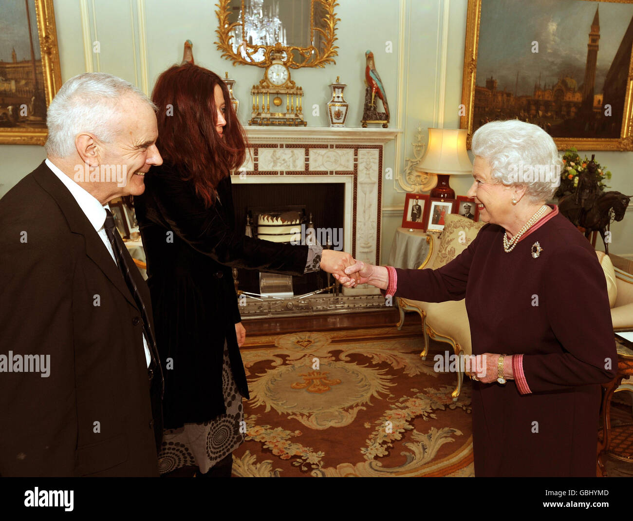 Queen Elizabeth II presents music medal Stock Photo - Alamy