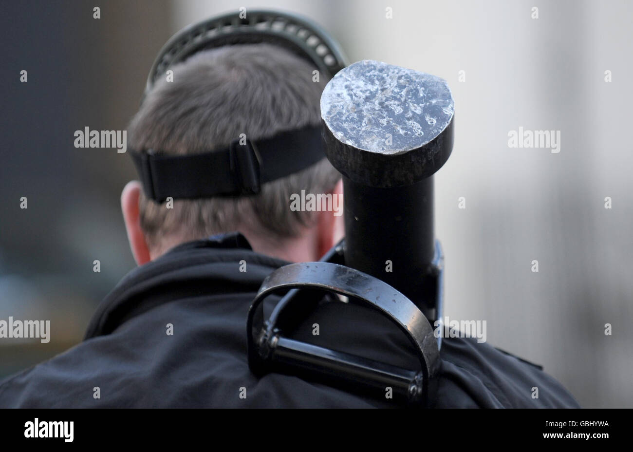 Police prepare to raid a property in west London, part of a series of ...