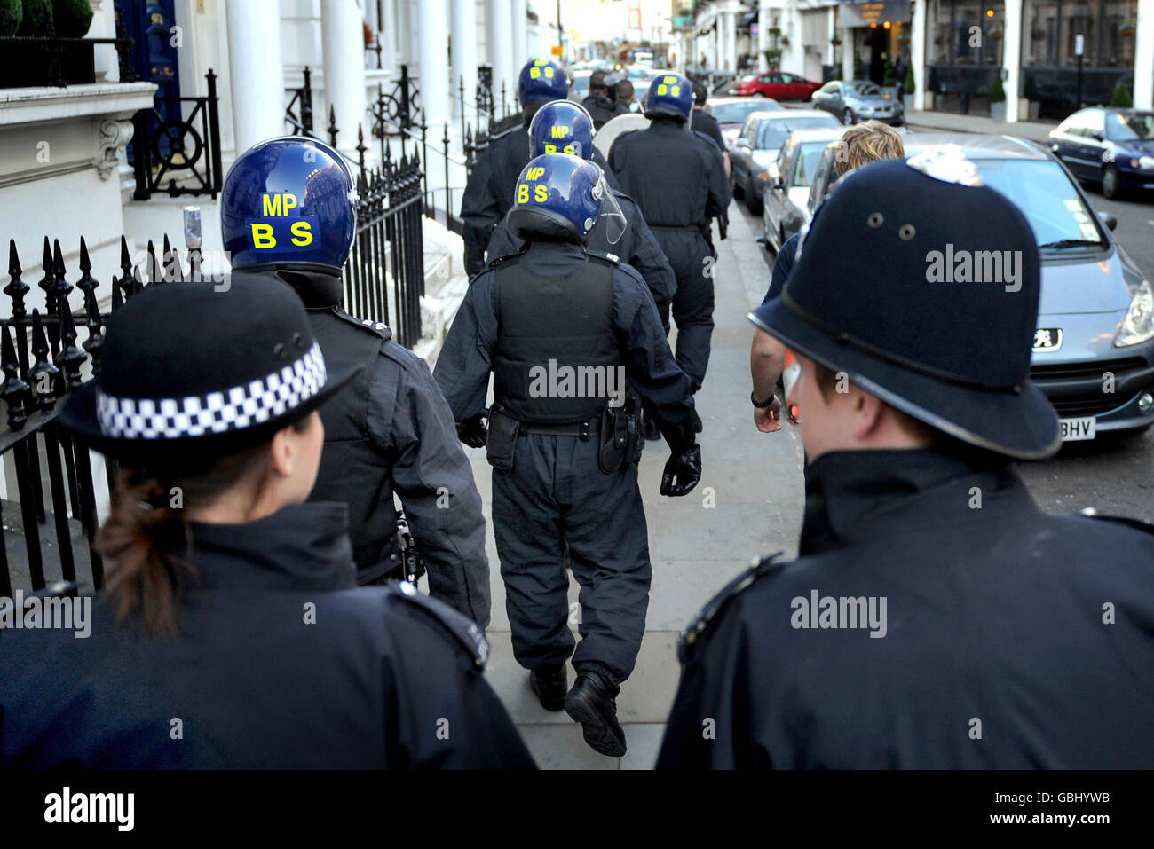 Back view police raid hi-res stock photography and images - Alamy