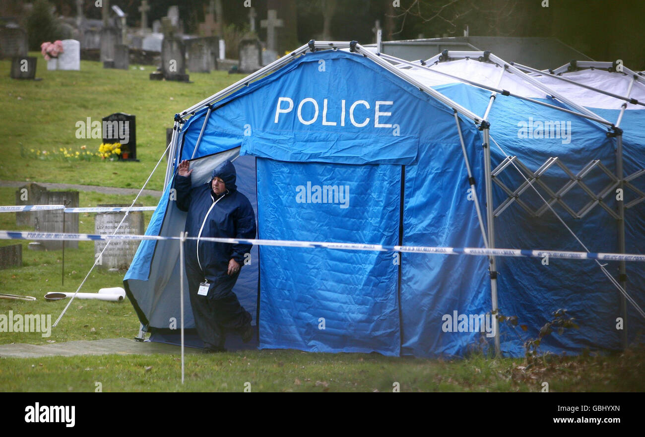 Police exhume unidentified body Stock Photo - Alamy