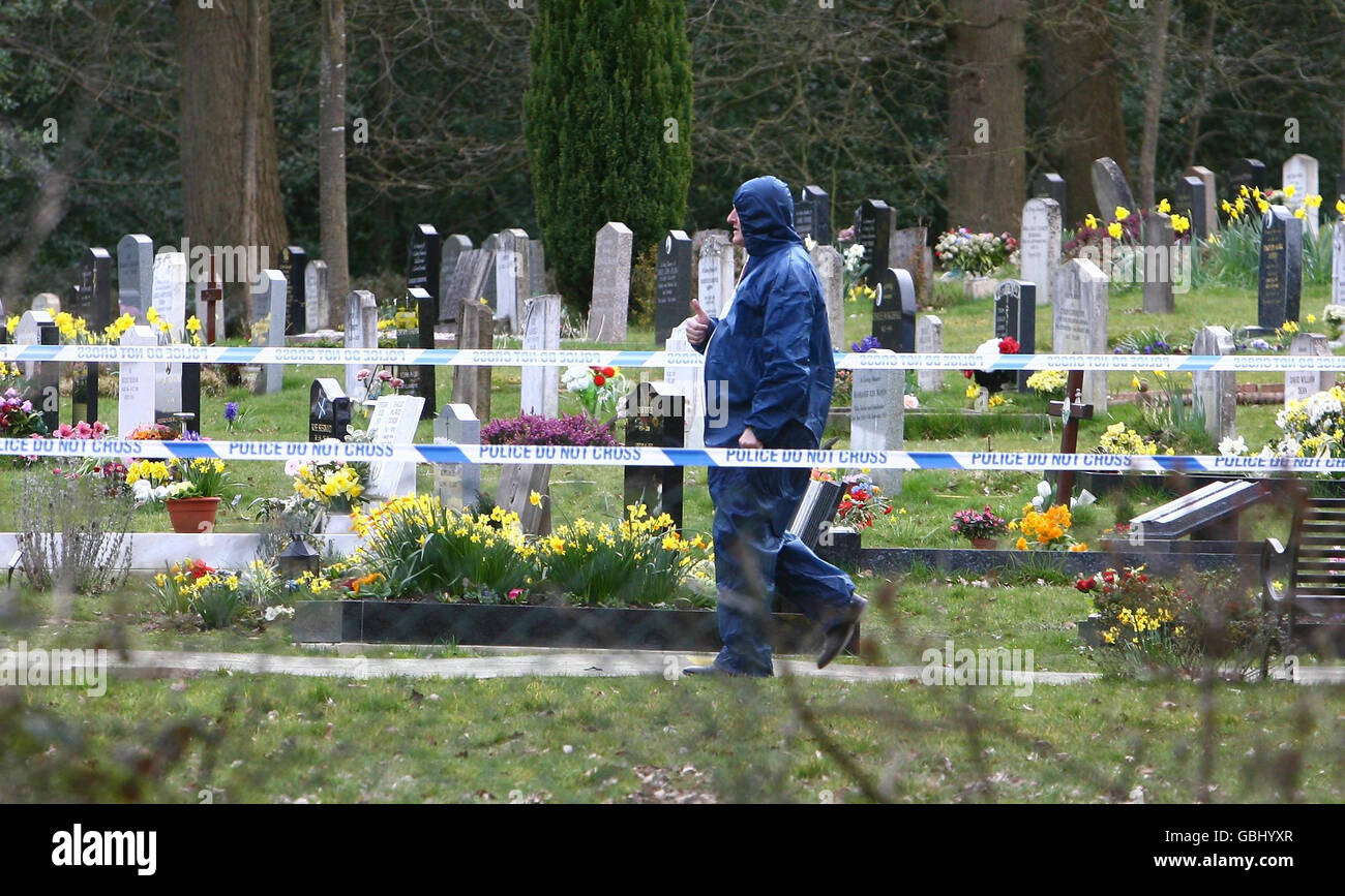 Police exhume unidentified body Stock Photo - Alamy