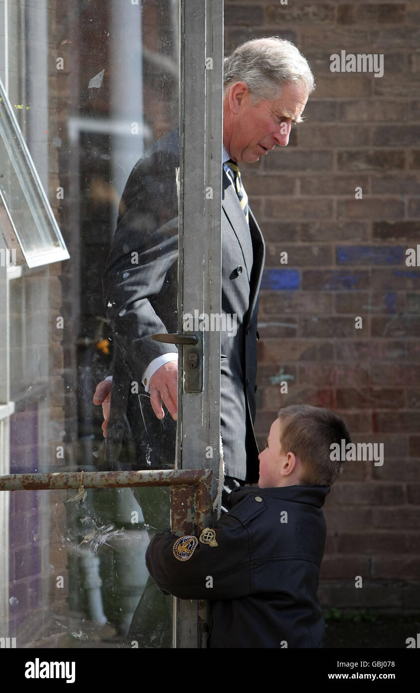Four-year-old Callum Rowlinson holds the door open for the Prince of ...