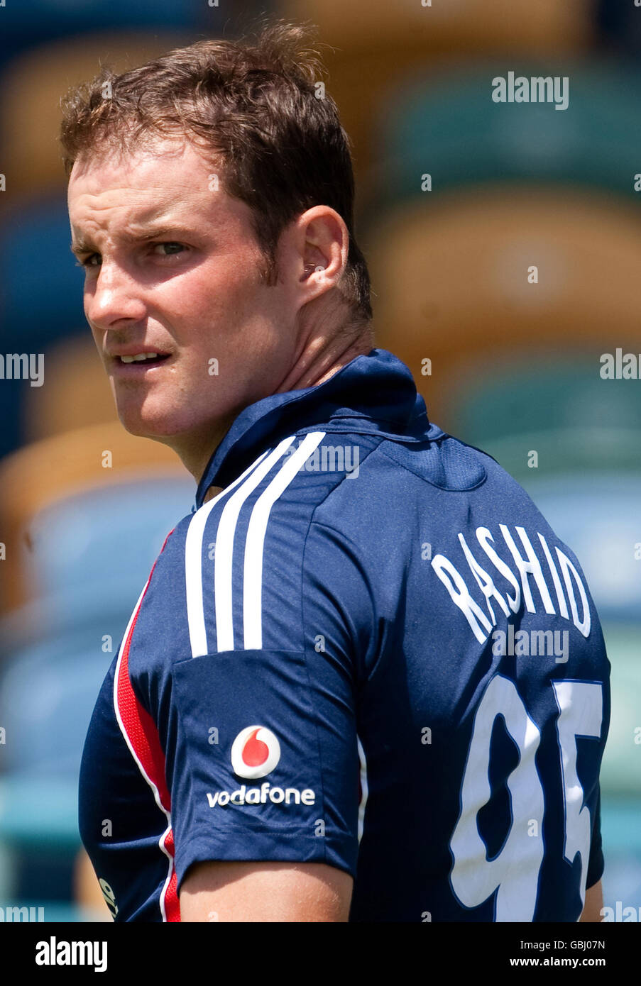 England captain Andrew Strauss poses for the team photo with a jersey ...