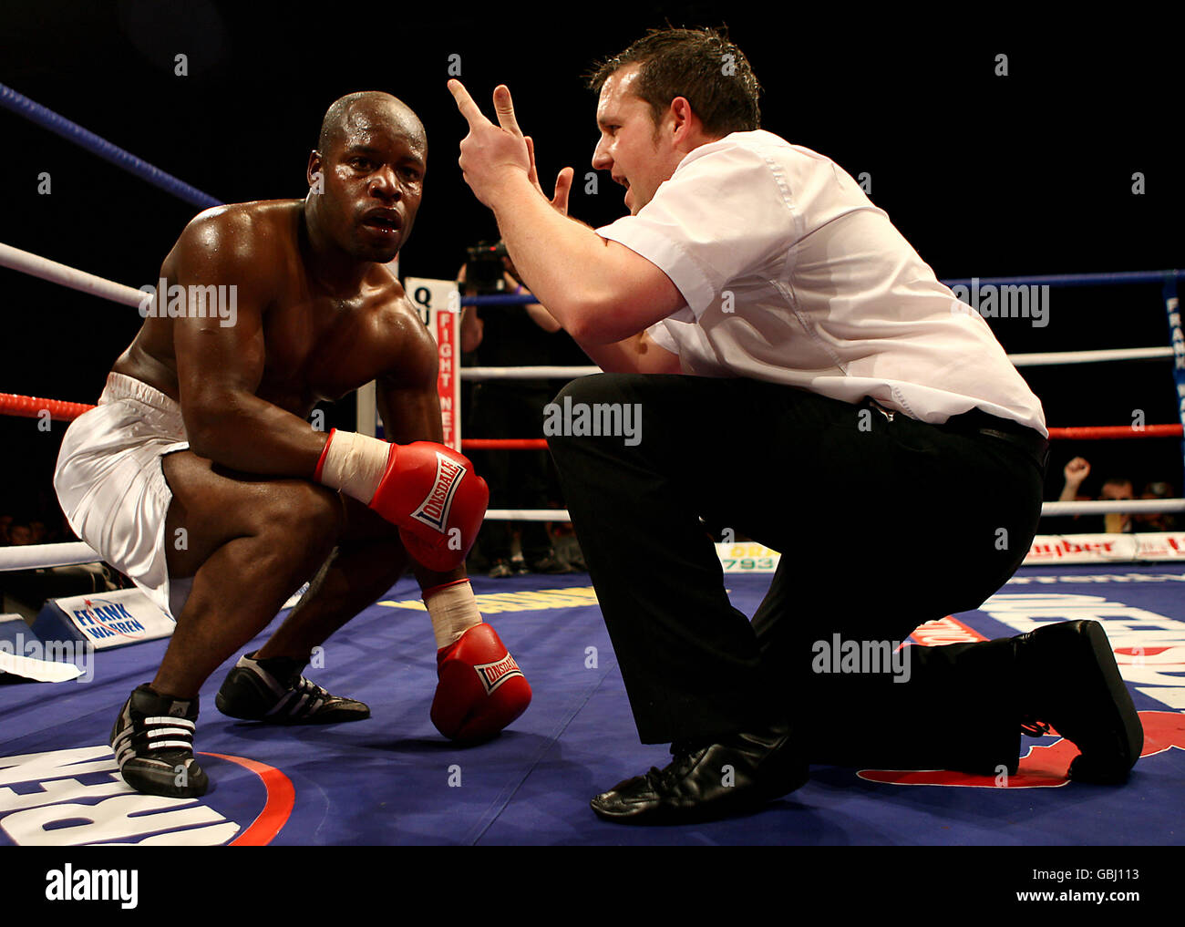 Sherman Alleyene is given the count by the referee after being knocked ...