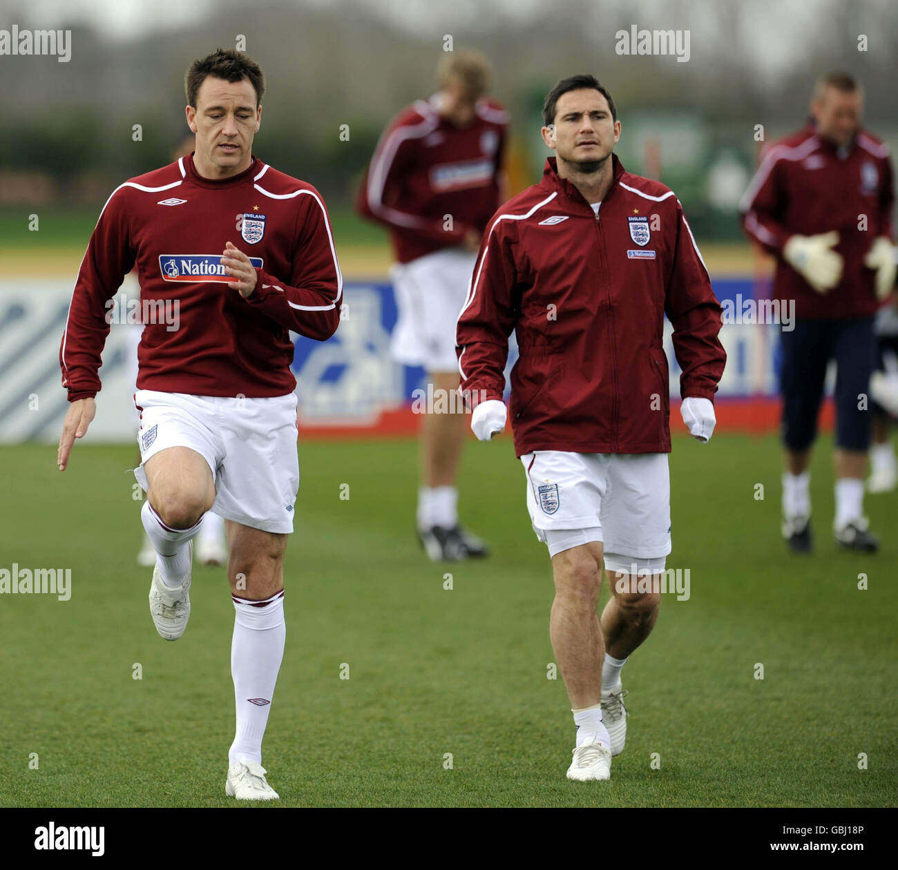 England's John Terry and Frank Lampard (right) during a training ...