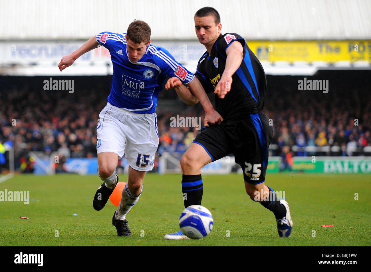 Peterborough United's Paul Coutts and Leicester City's Jack Hobbs ...