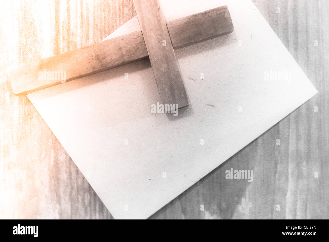 A holy Christian wooden cross on a piece of note paper Stock Photo - Alamy