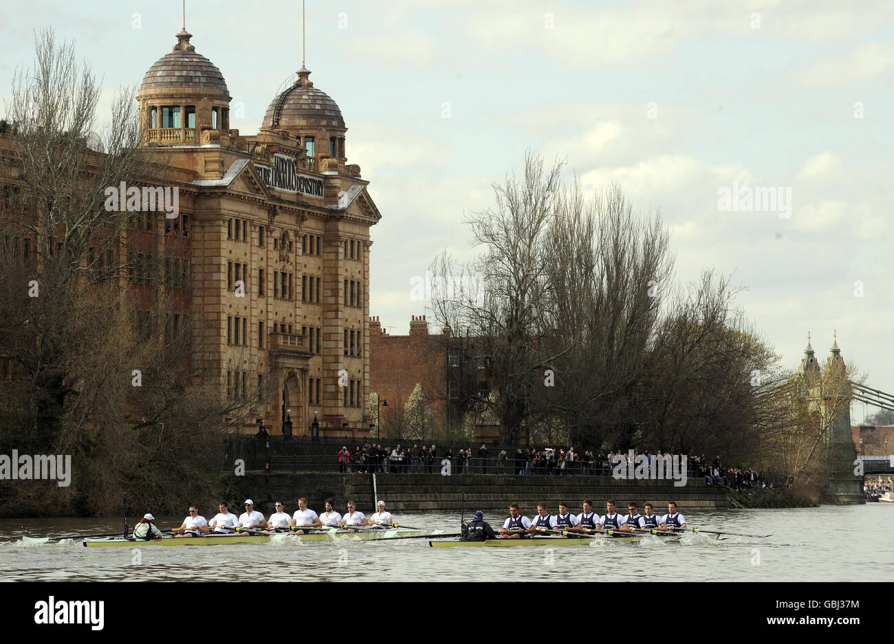 Oxford (right) and Cambridge vie for the lead as they pass Harrods ...