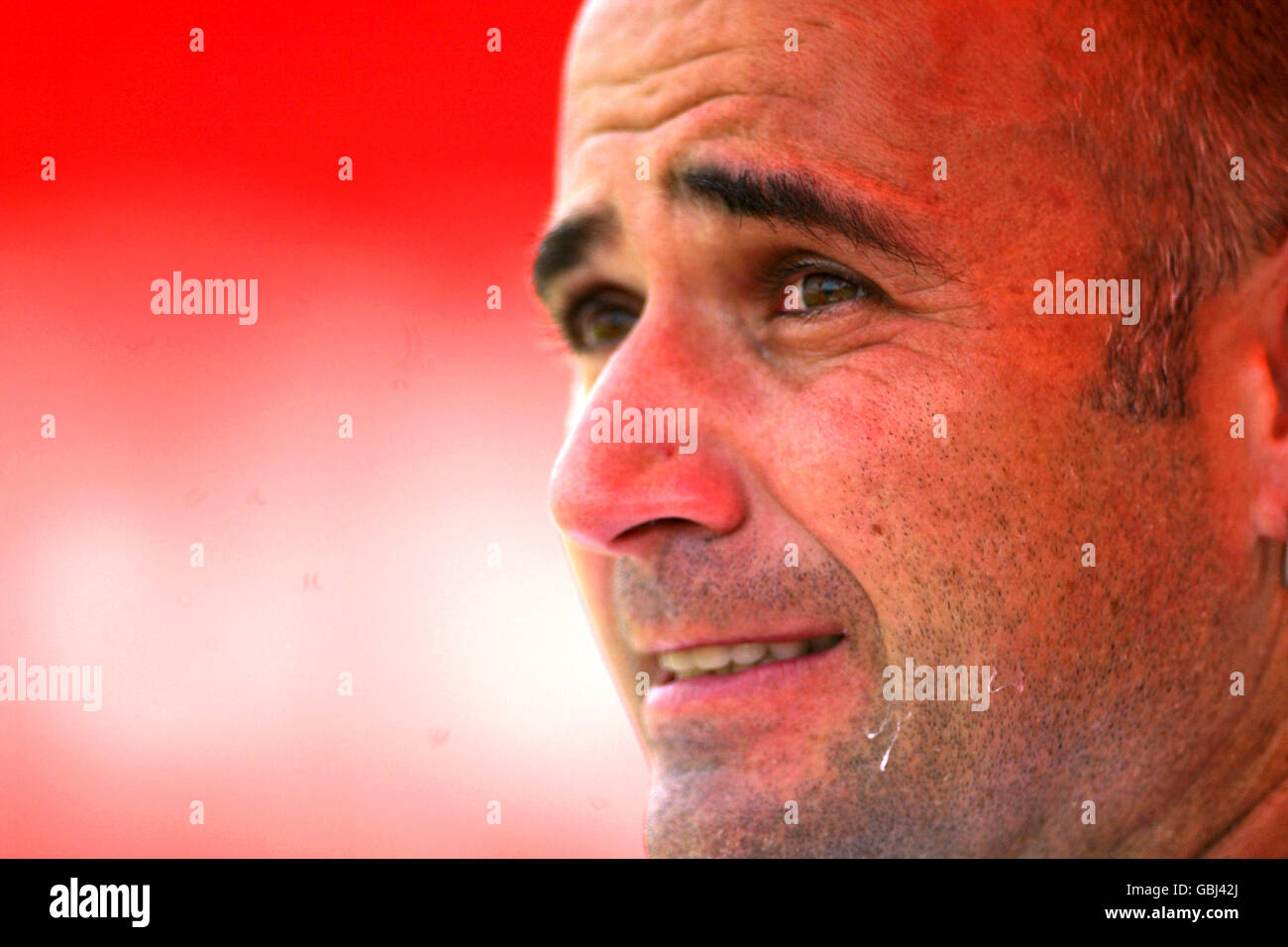 Andre Agassi ponders how he lost the second set to Igor Andreev Stock ...