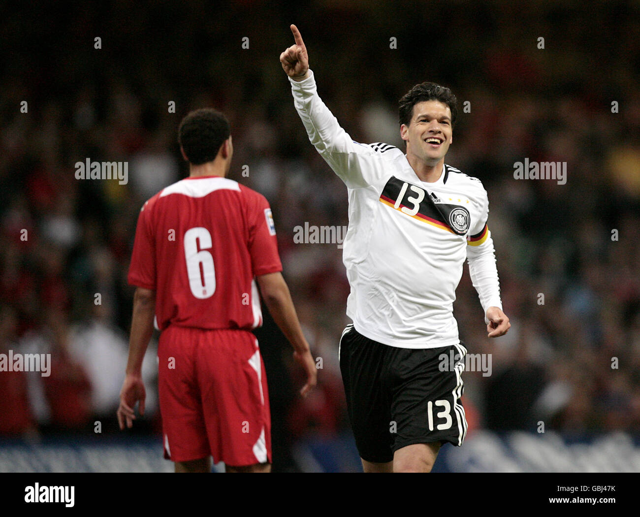 Germany's Michael Ballack (right) celebrates after scoring the opening ...
