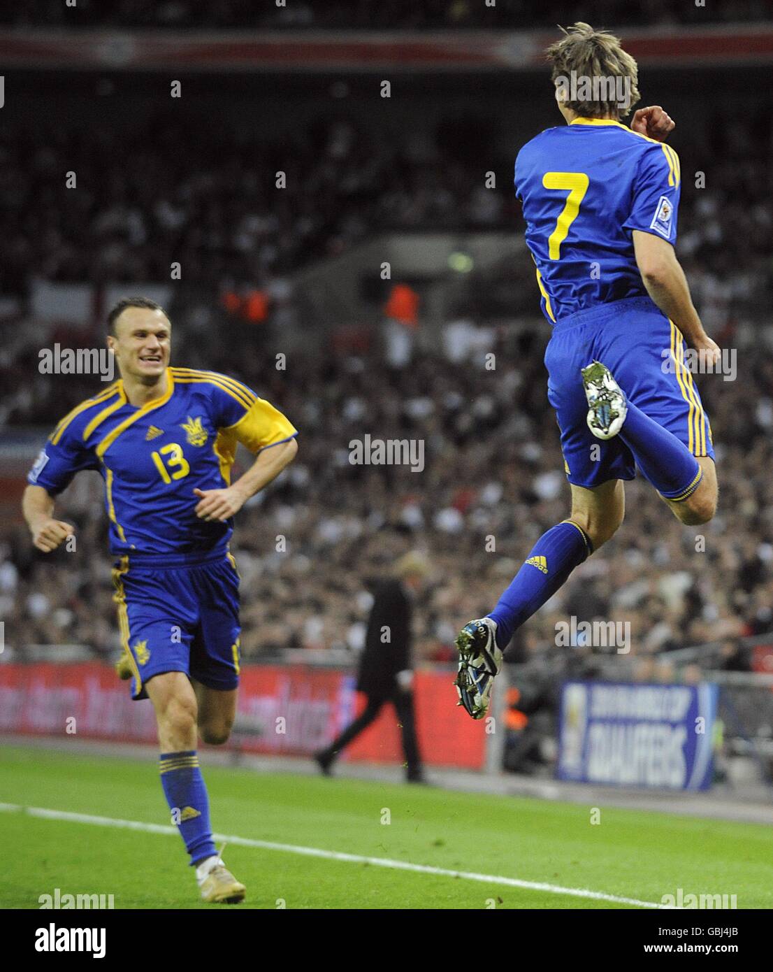 Ukraine's Andriy Shevchenko (right) celebrates after scoring the second ...
