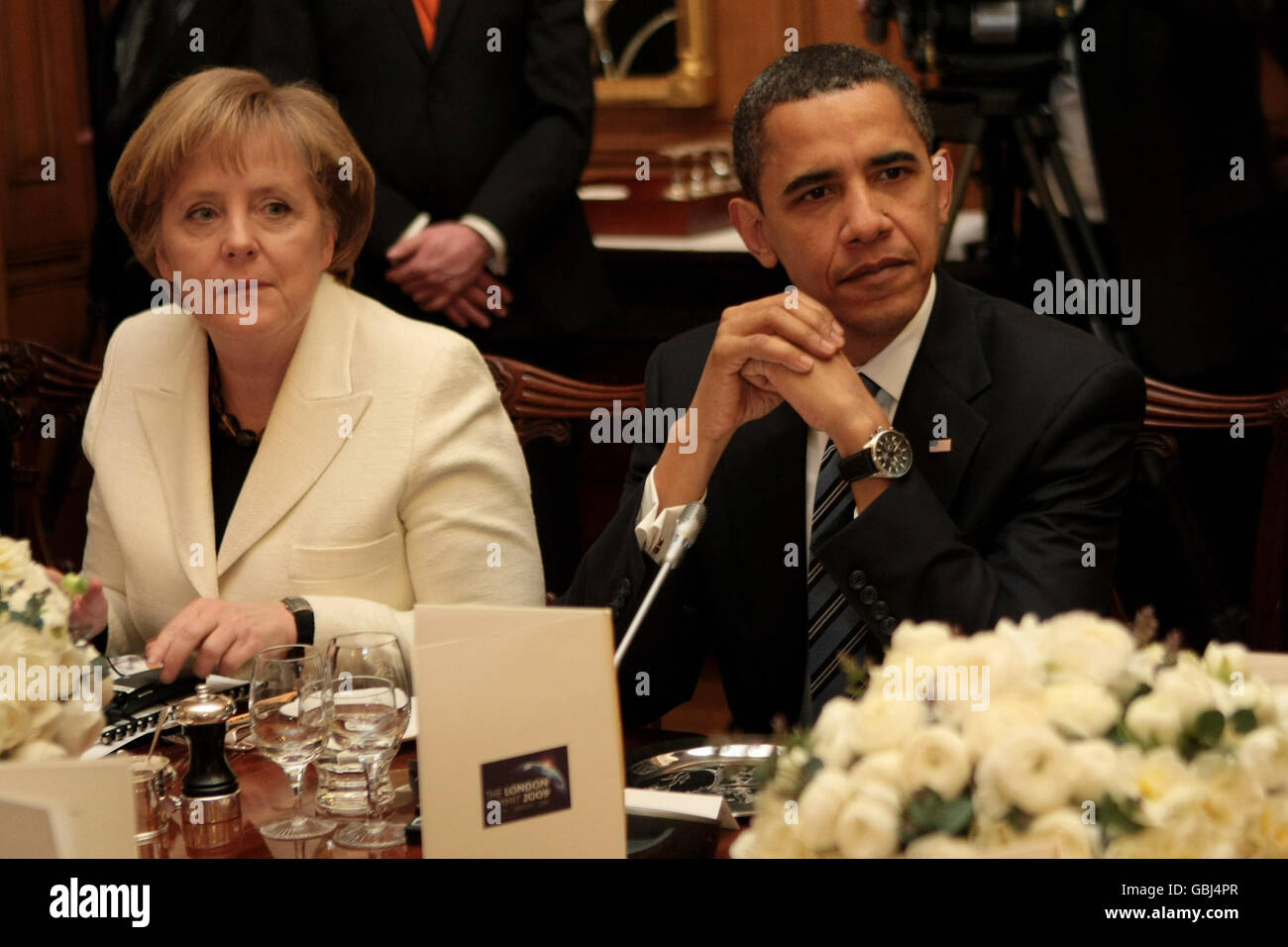 US President Barack Obama and German Chancellor Angela Merkel attend a ...