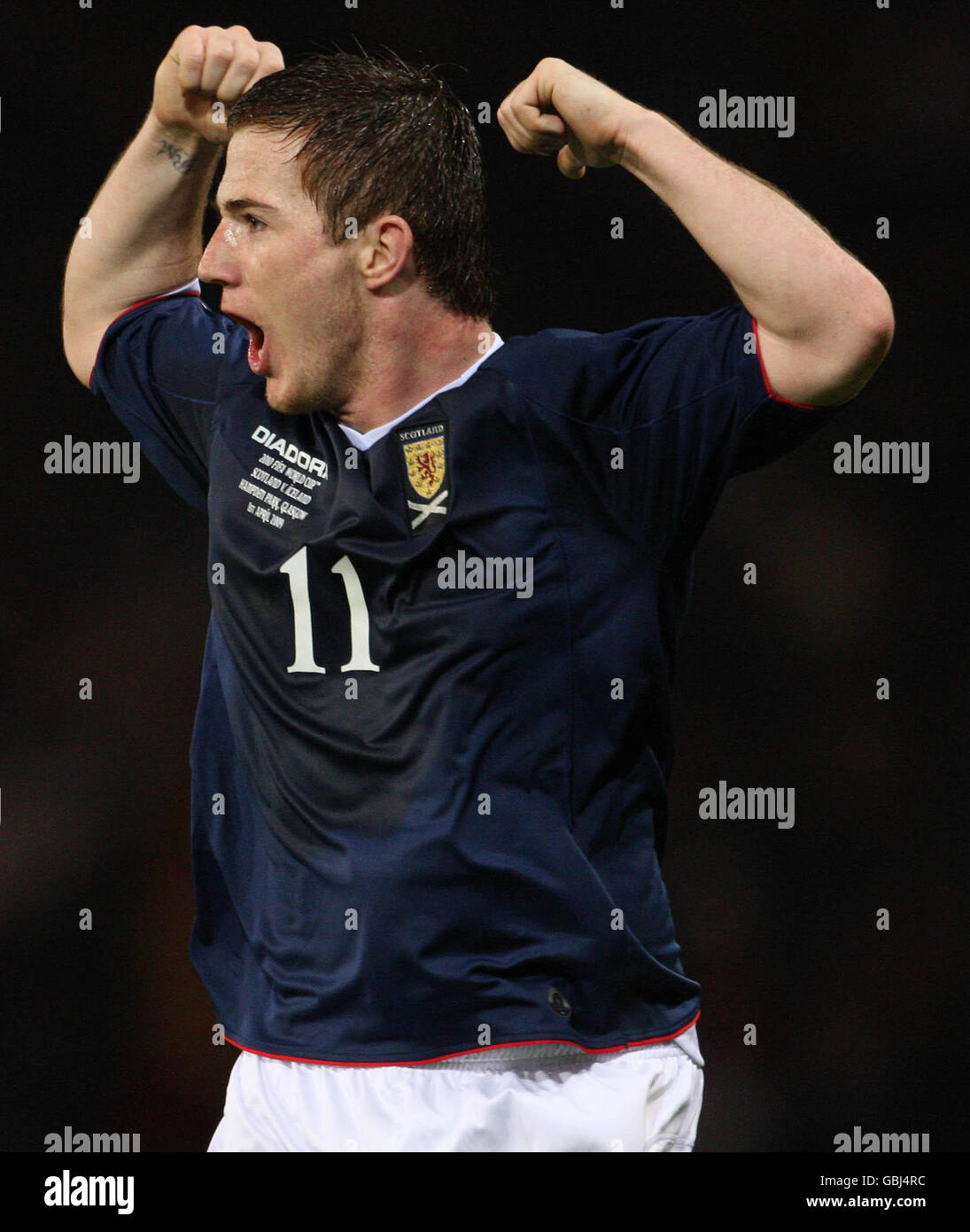 Football action celebrating arms raised clenched fist hi-res stock ...