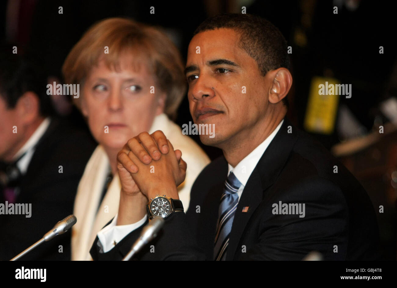 US President Barack Obama and German Chancellor Angela Merkel attend a ...